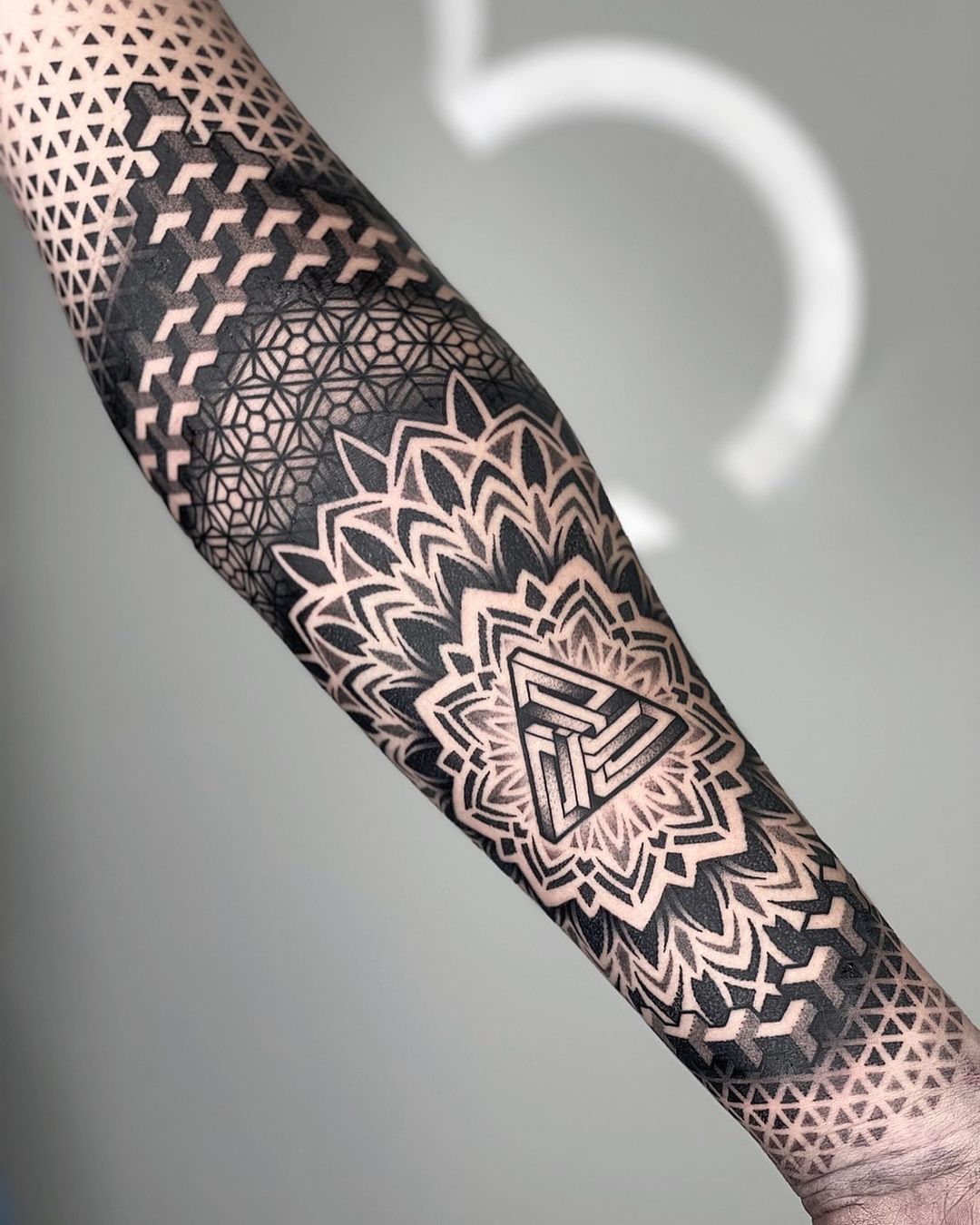 Geometric Dotwork Tattoos