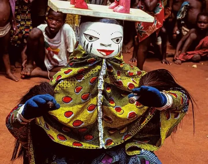 Gelede masquerade performed by men acts as a type of spiritual drag, in ...