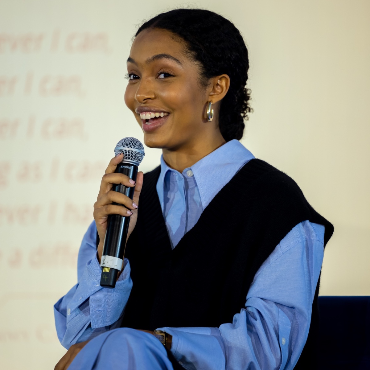 Woman Giving A Speech To A Crowd