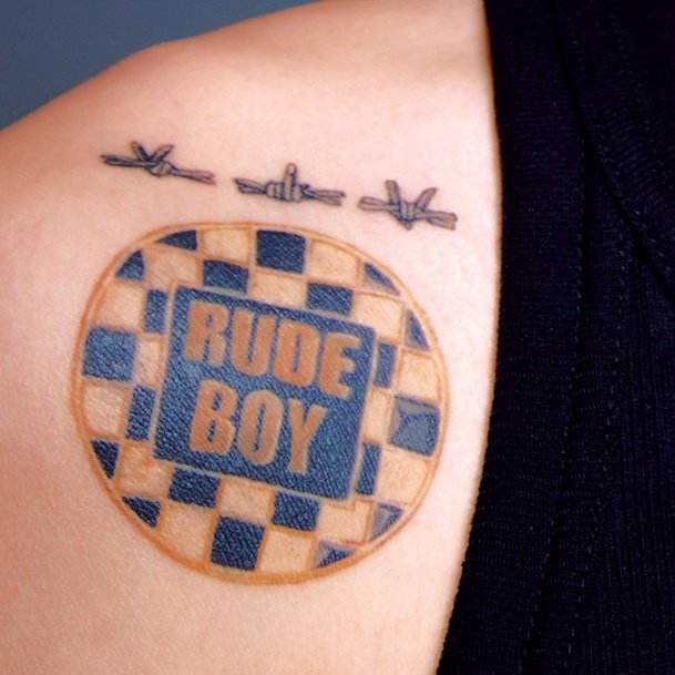 . on Twitter: "RT @musetaeyong: The barbed wire above the Rude Boy tattoo, damn Taeyong's so ...