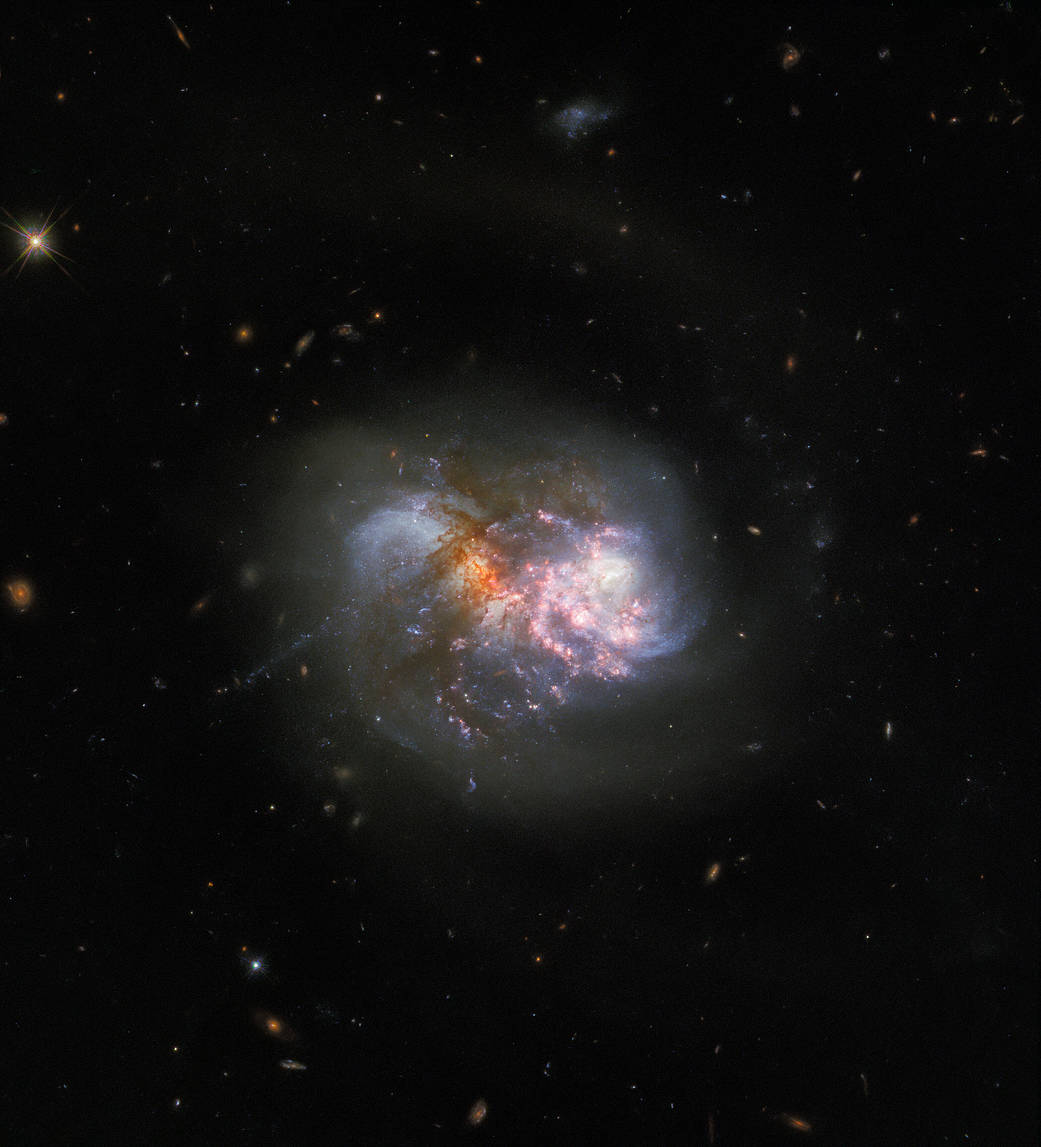 Universal-Sci on Twitter: "A cataclysmic cosmic collision of a galaxy pair named IC 1623 The 2 ...