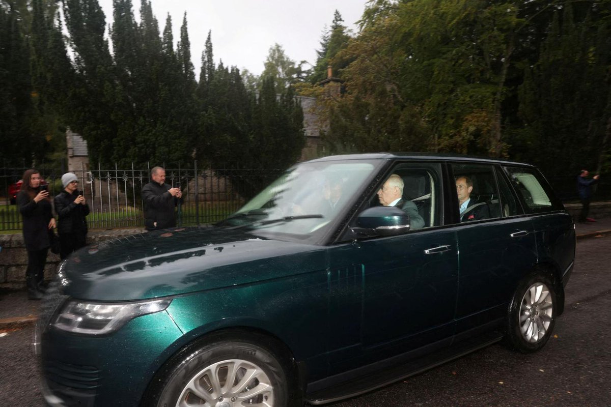 LOOK: Britain's Prince William drives a vehicle with Prince Edward and Prince Andrew, as they ...
