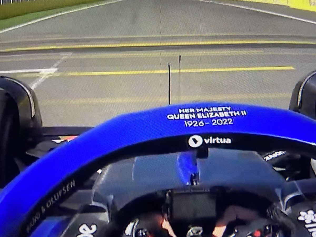 The Williams cars with a tribute to Queen Elizabeth II on the halo at ...