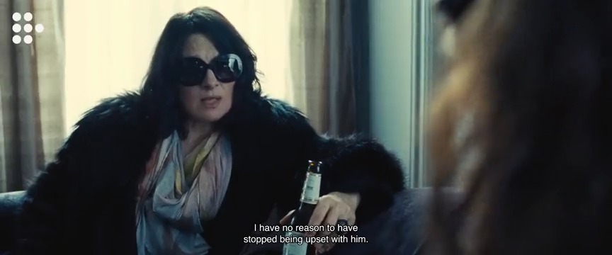 Olivier Assayas's self-reflexive story of dualities, mirror reflections, and power dynamics ...