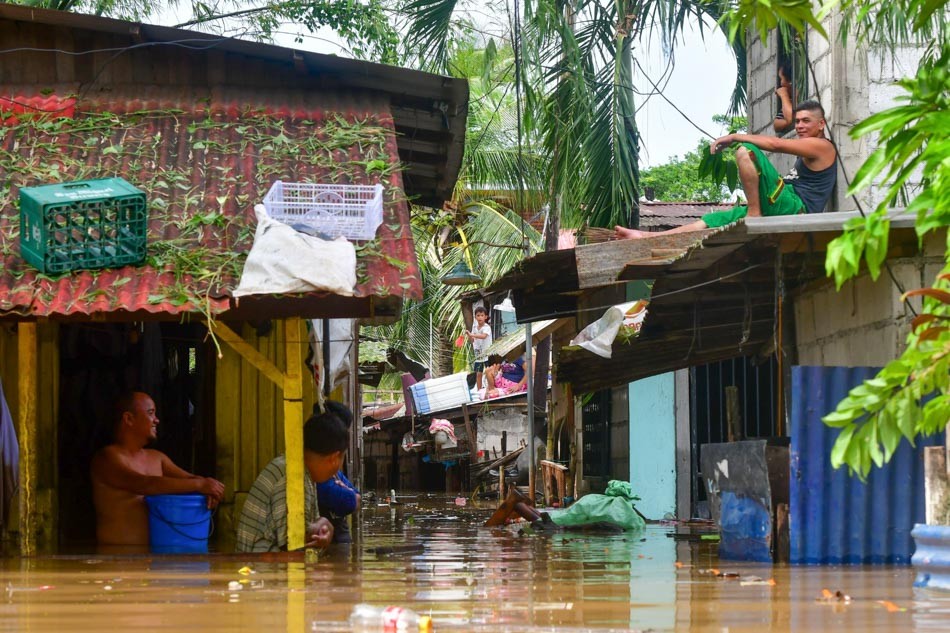 LOOK: Waist to chest-deep flood hits residential homes in Barangay ...