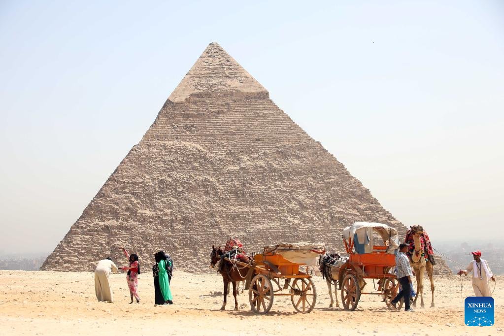 Tourists visit the Giza #Pyramids scenic spot during the World Tourism ...