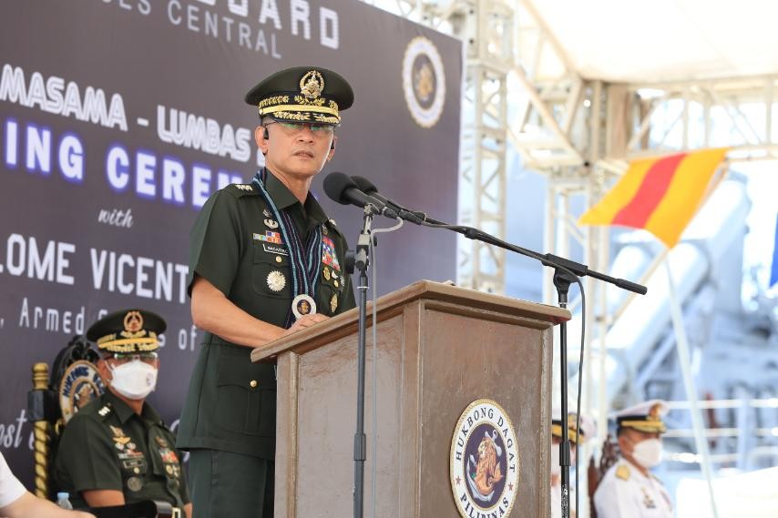 Lt. Gen. Bartolome Vicente Bacarro, AFP Chief of Staff, leads the ...