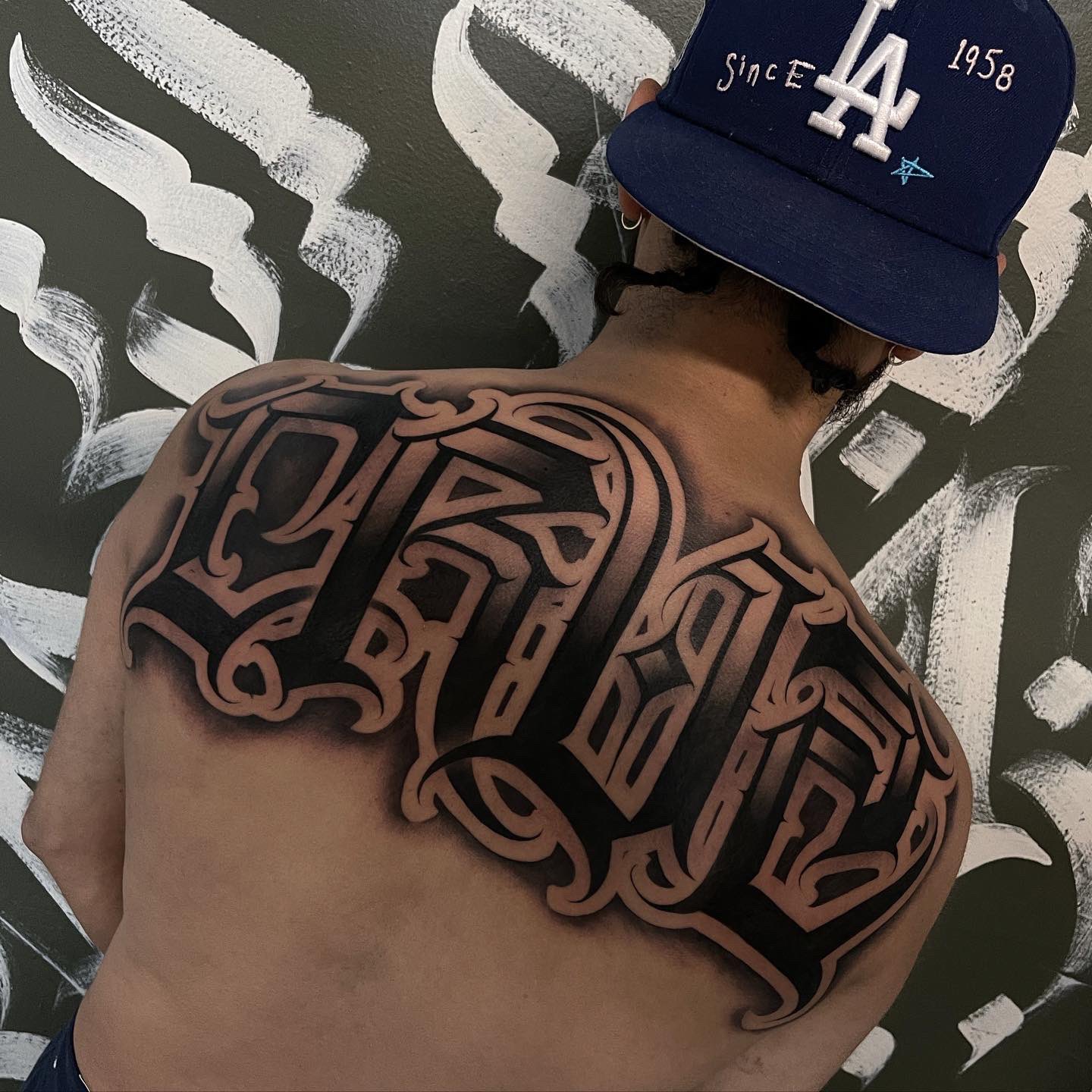 Last Name Back Tattoo Designs