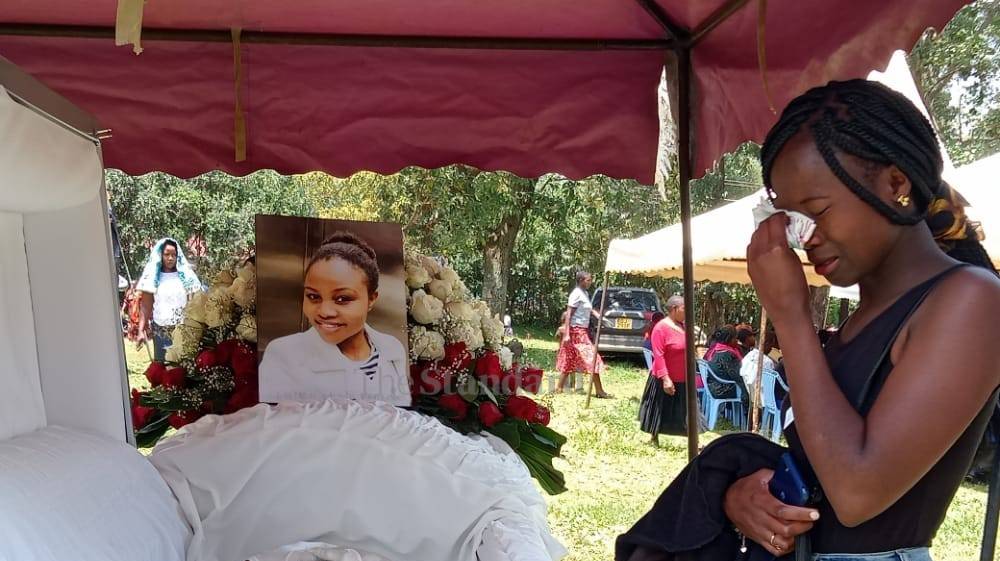 Mourner reacts after viewing the body of Hellen Kemunto Wendy Nyabuto ...