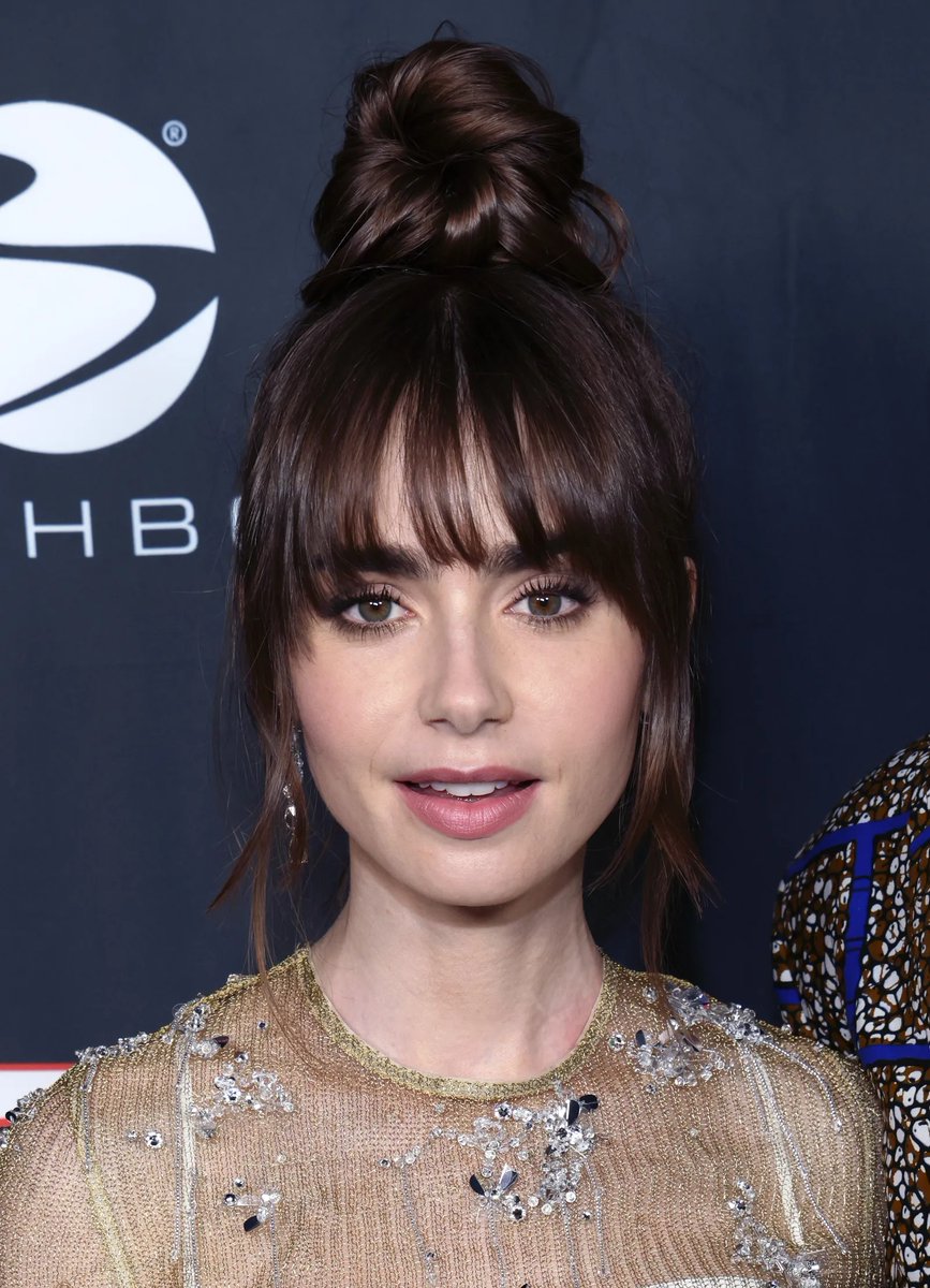 Lily Collins just stepped out in a very Emily Cooper-inspired top knot ...