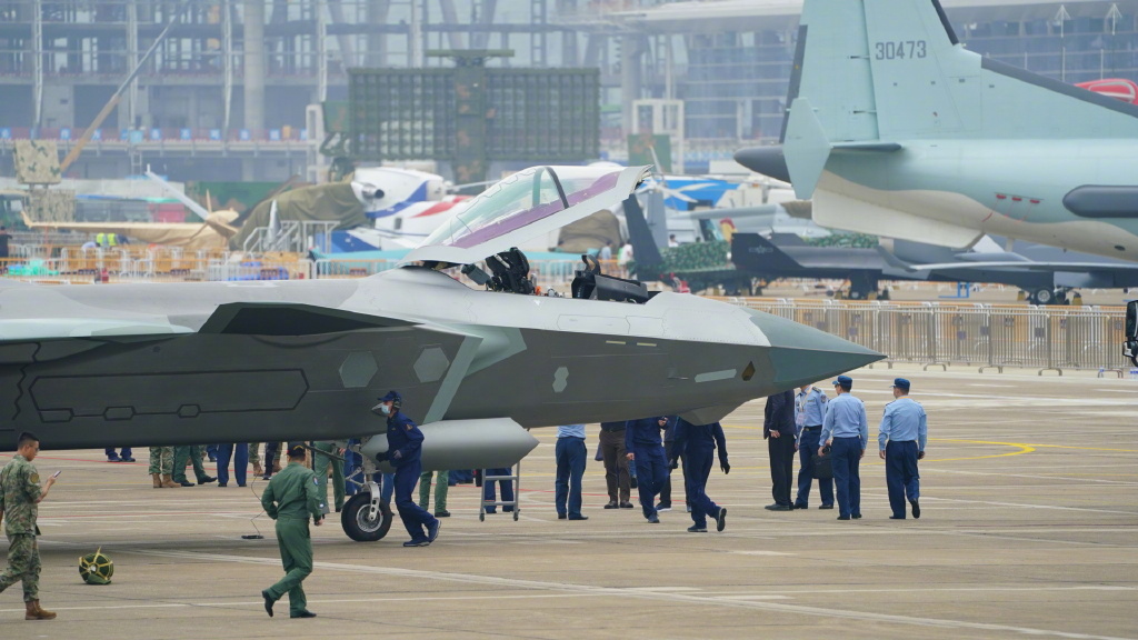 Two J-20 stealth fighter jets were captured on camera landing at an ...