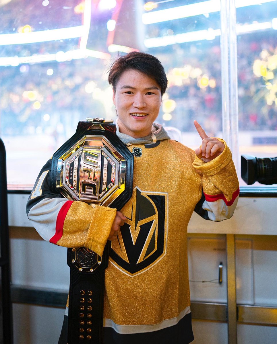 Gold looks good on her 🤩 Strawweight champ @MMAWeili taking in her ...