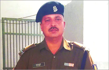 Dec 13, 2001, a white Ambassador passed through the gates of a ...