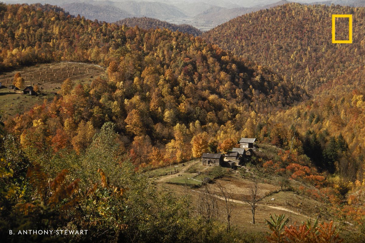 A scenic view of farms settled in a West Virginia hillside forest ...