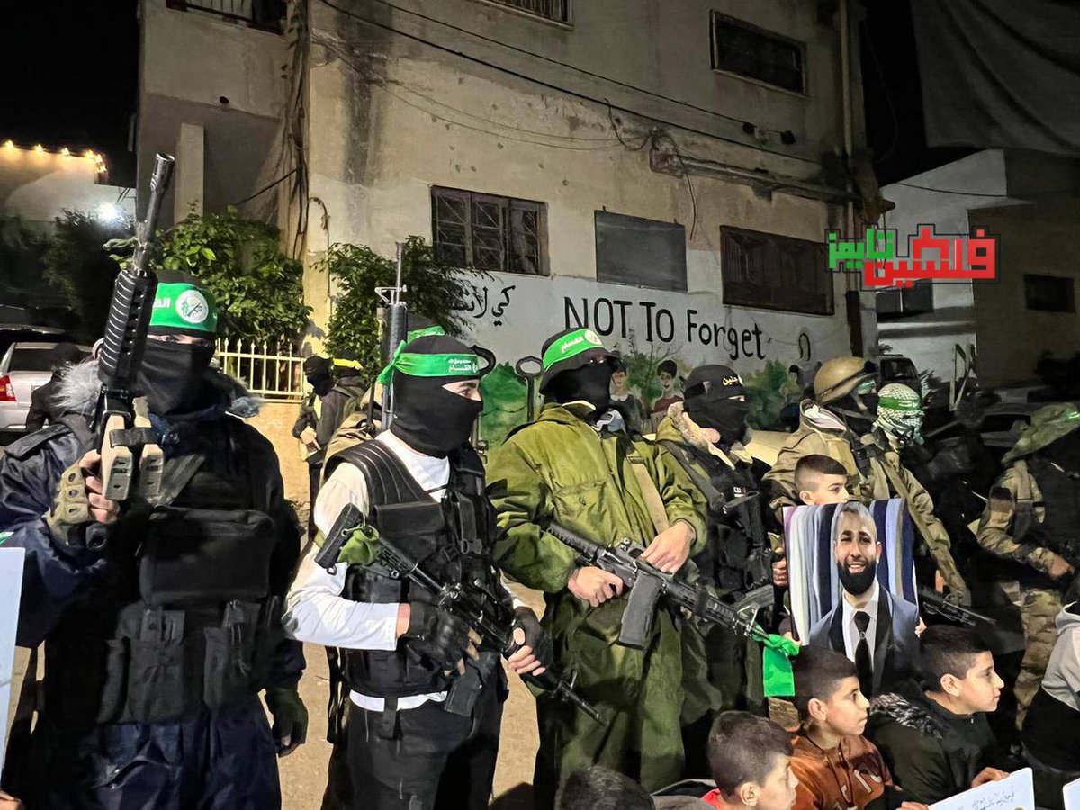 Armed Palestinians militants (Members of Jenin Battalion) marching in ...