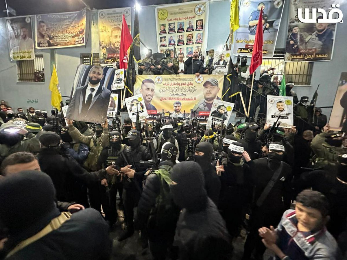 Armed Palestinians militants (Members of Jenin Battalion) marching in ...