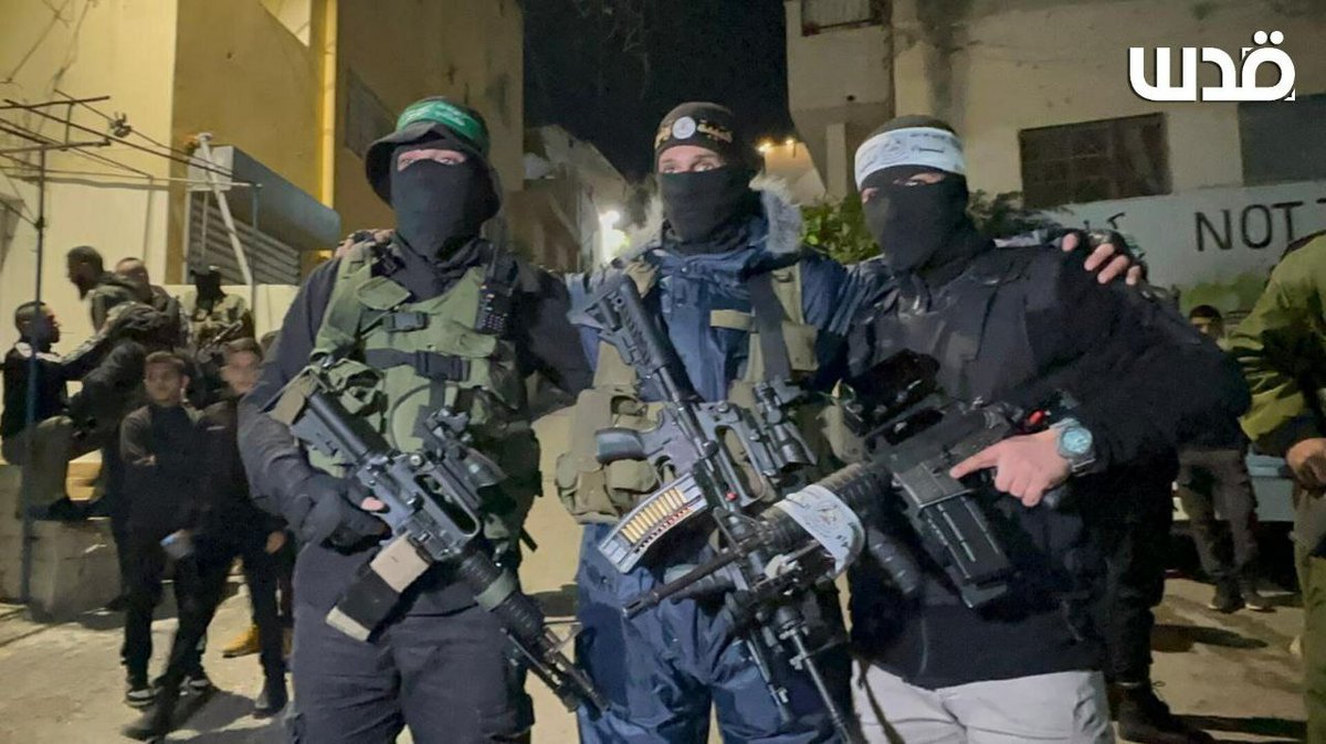 Armed Palestinians militants (Members of Jenin Battalion) marching in ...