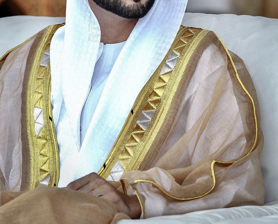 The bisht is a men’s cloak worn over a thobe — or ankle-length tunic ...