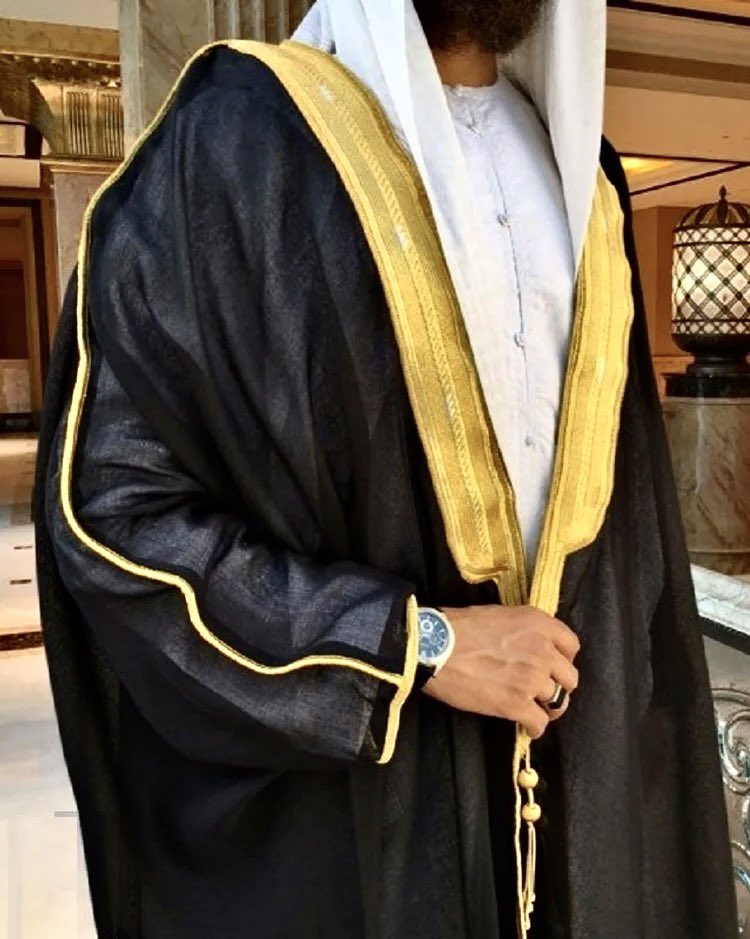 The bisht is a men’s cloak worn over a thobe — or ankle-length tunic ...