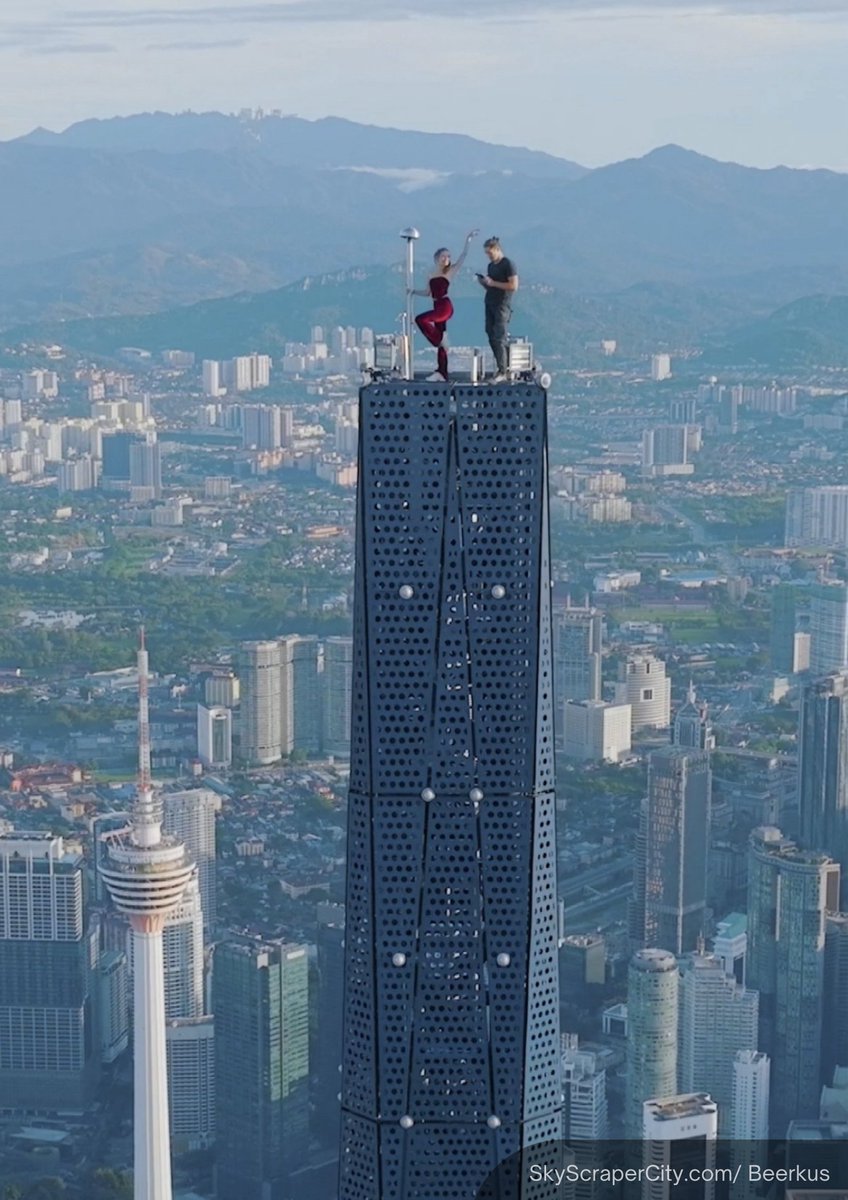 1. Ivan Beerkus and Angela Nikolau, who illegally climbed to the top of ...