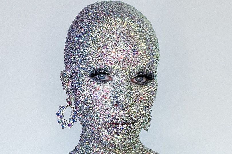 TikTok make up artist spends 27 HOURS covering herself in gems to ...