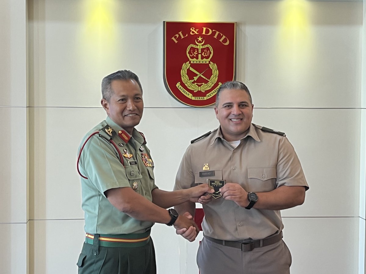 In a meeting w/ Major General Tungku Fauzi, Commander of the Malaysian ...