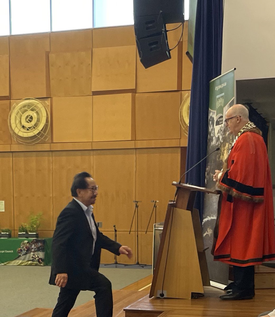 Kuringgai Citizen of the Year Tony Pang comes on stage to accept his ...