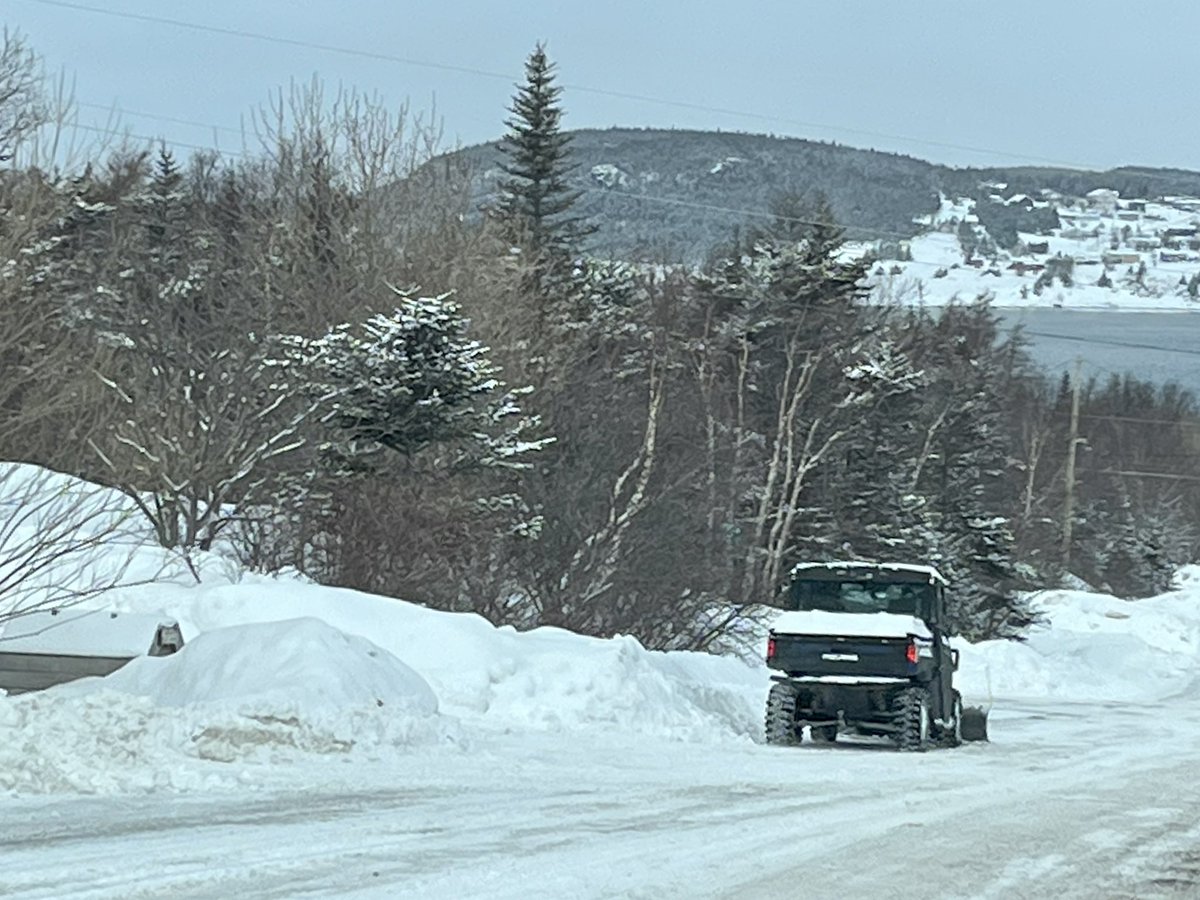 The little snow plow just finishing our driveway this morning. This ...