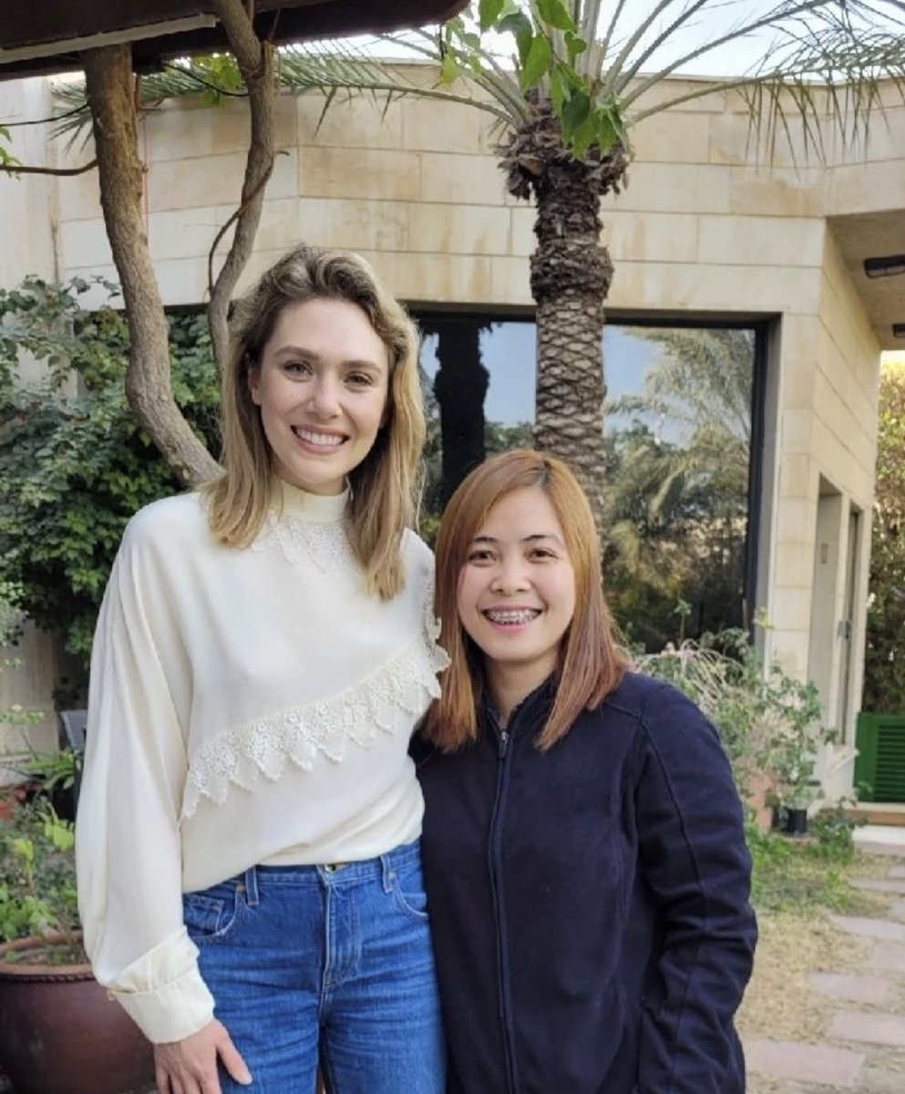 Elizabeth Olsen with fans and start at Comfest Con in Kuwait. Elizabeth ...