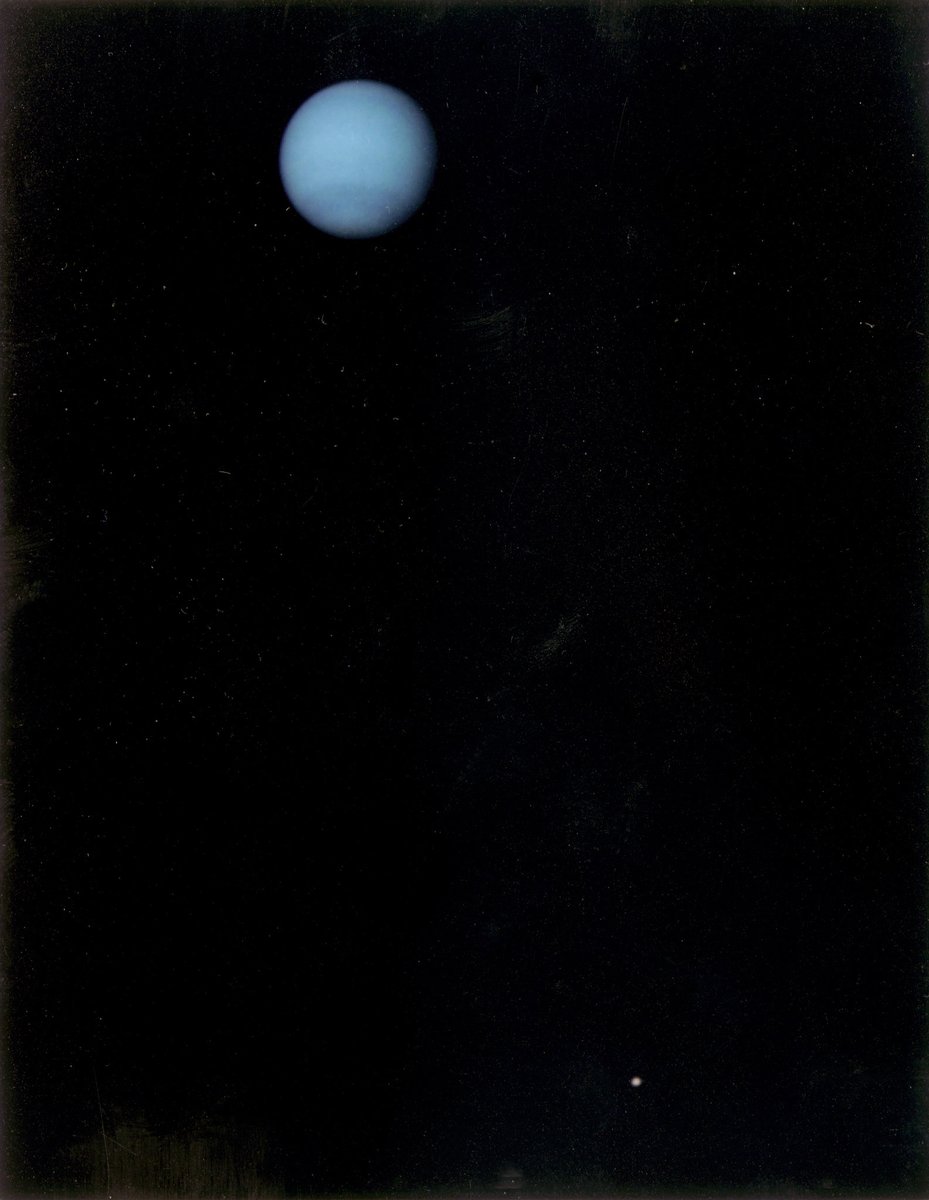 Neptune and Triton This image was returned by the Voyager 2 spacecraft ...