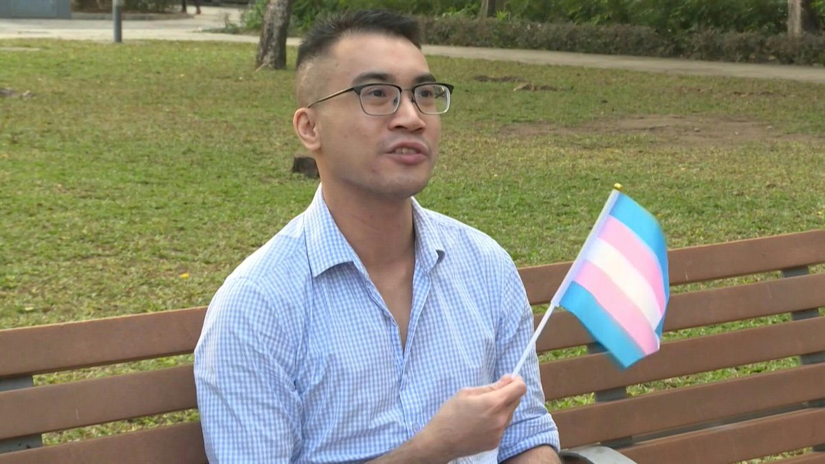 VIDEO: Identified as "female" on his Hong Kong ID, trans activist Henry ...