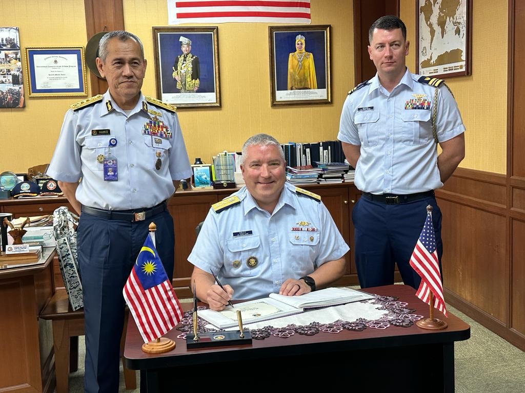 Pacific Area Deputy Commander Rear Admiral Matthew Sibley, USCG, and ...