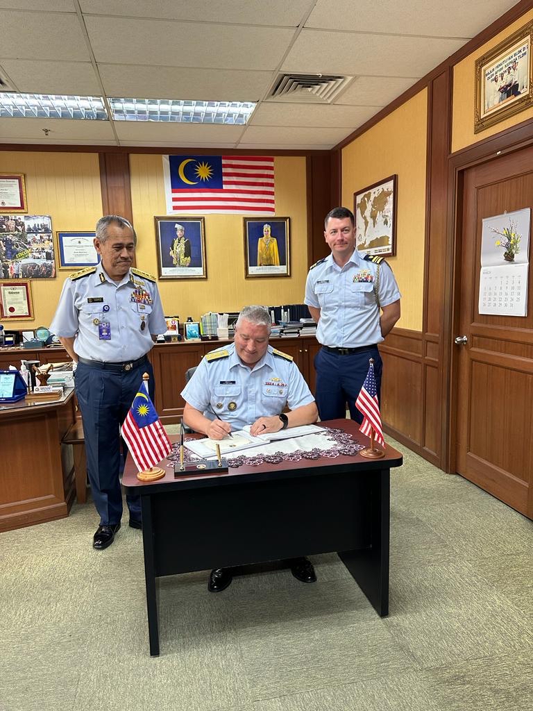 Pacific Area Deputy Commander Rear Admiral Matthew Sibley, USCG, and ...