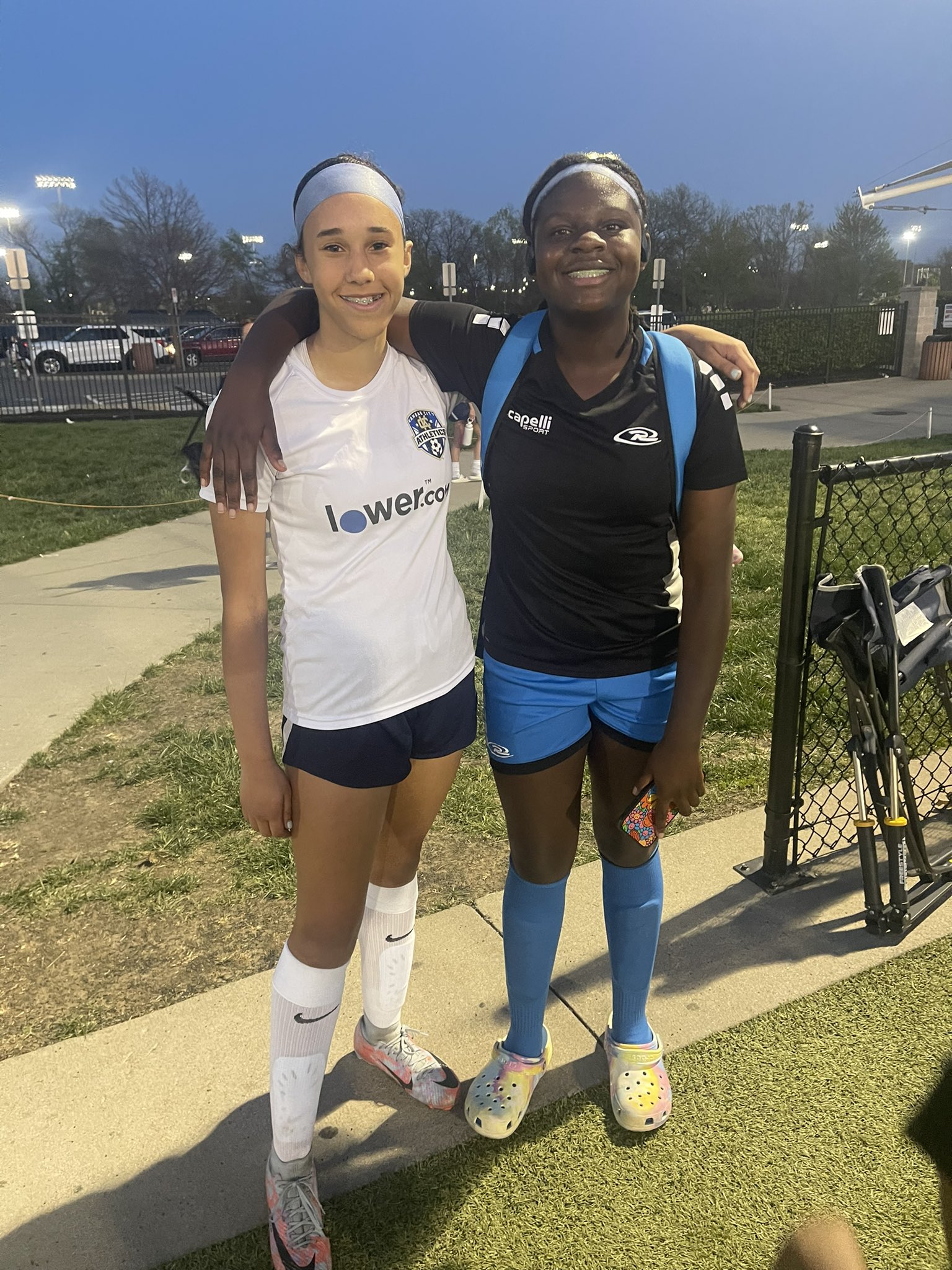 Girl Best Friends Playing Soccer