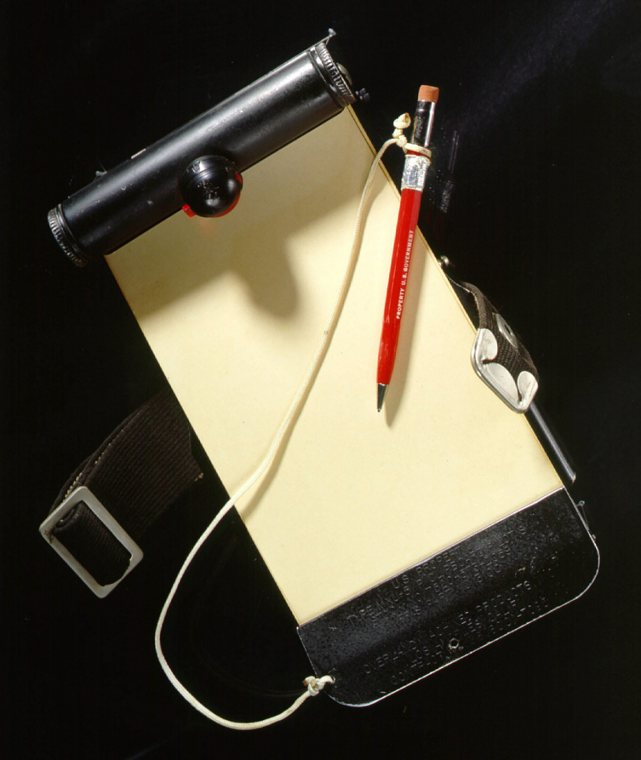 This note pad and pencil were issued to astronaut John Glenn for use on ...