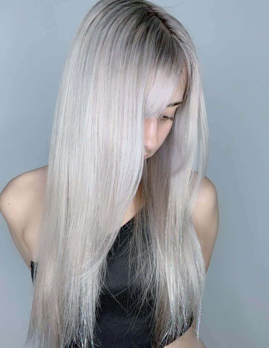 Got my roots done, hair toned a more silver-blonde and some tinsel 🩶 by ...