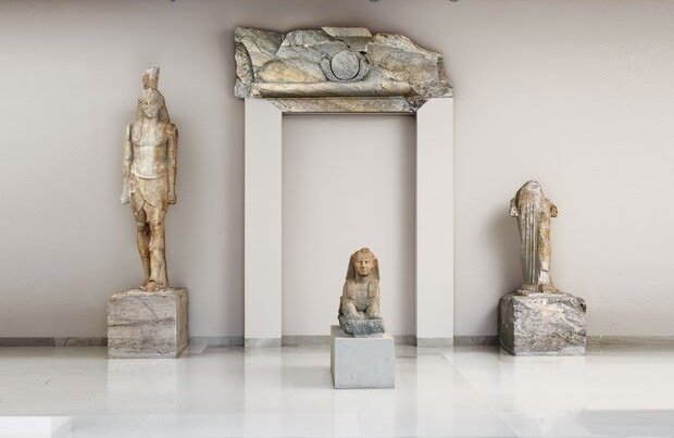 Statues of Egyptians Gods guarding the four entrances around a ...