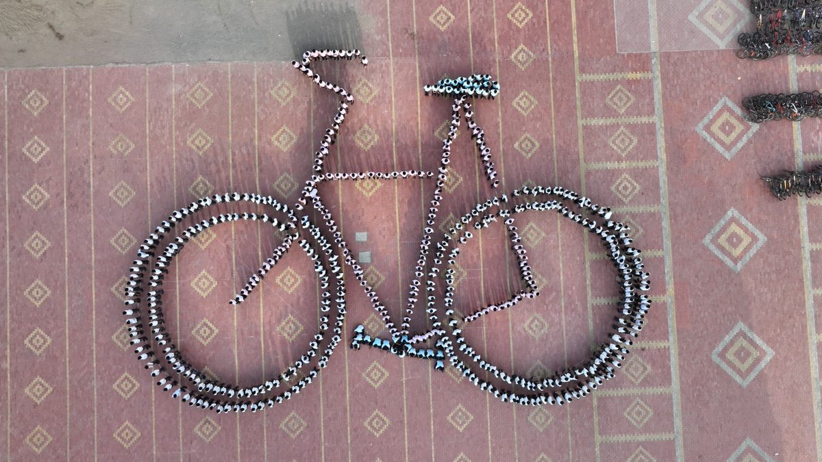 In pictures: 500 students create human figure of bicycle in Surat ...