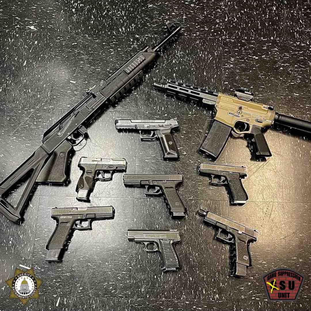 Gang With Guns Wallpaper