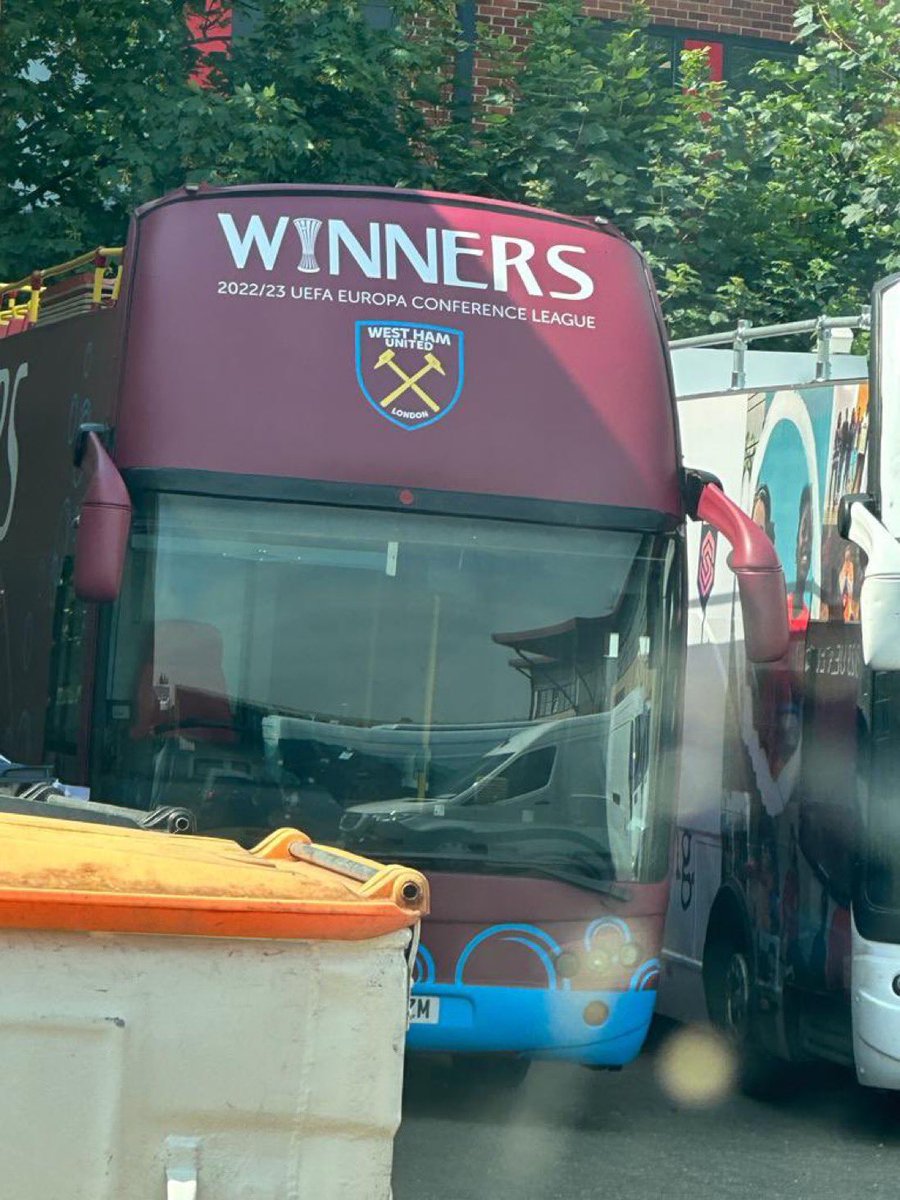 A West Ham open top bus with 'Winners - 2022/23 UEFA Europa Conference ...