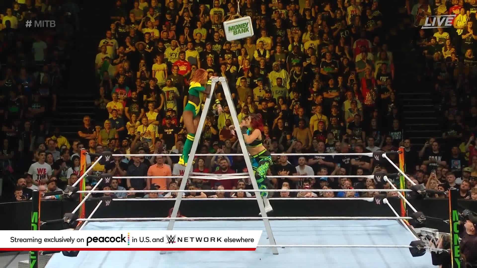 WWE on FOX on Twitter: "IYO gets the best of @BeckyLynchWWE & @itsBayleyWWE at #MITB 🎥 @WWE ...