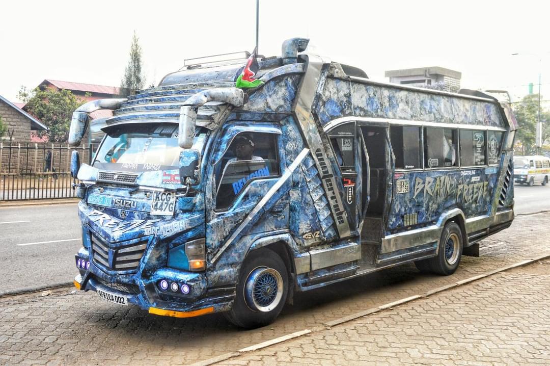 Traditionally designed buses in Nairobi, Kenya. They are called matatu ...