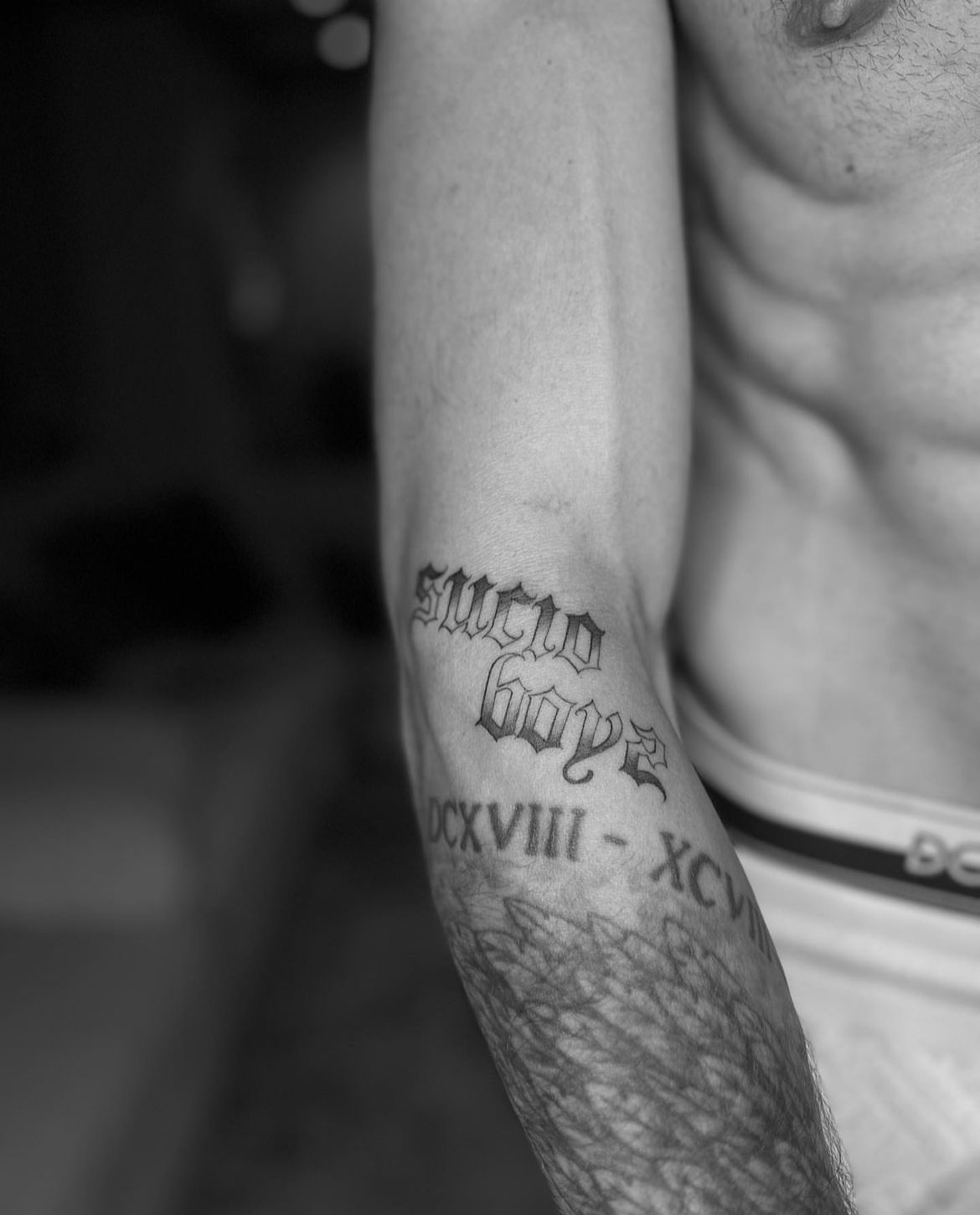 Roman Numeral Tattoo Ribs