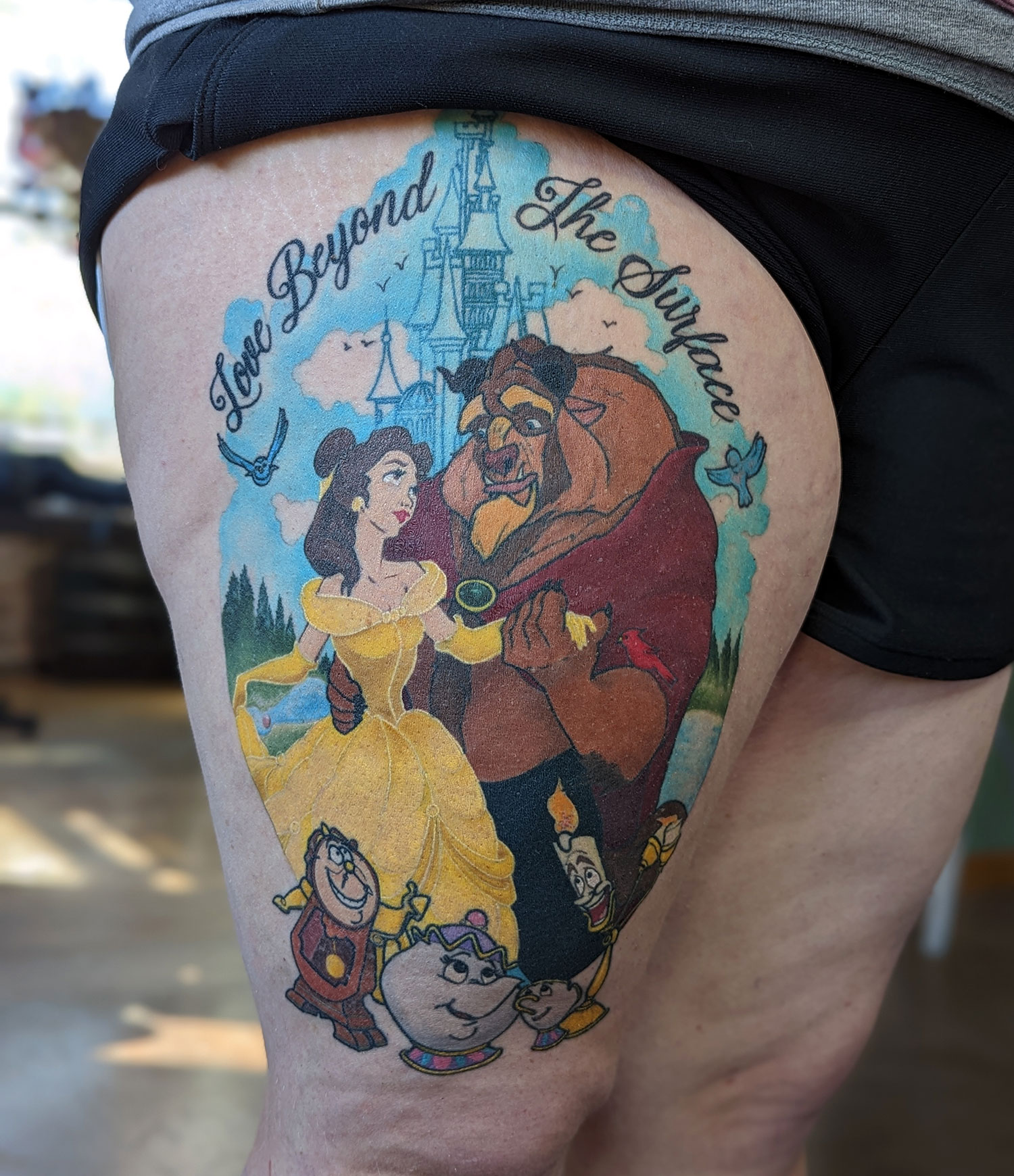 Beauty And The Beast Thigh Tattoo