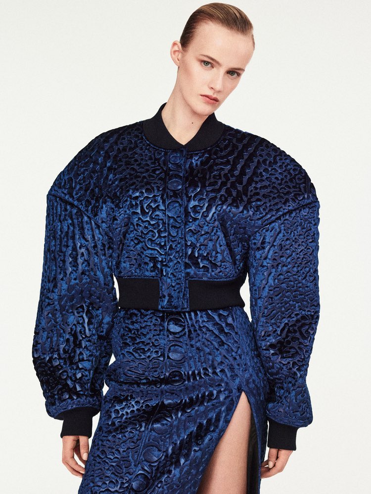 Pop Star Dua Lipa wearing a Schiaparelli FW25 blue velvet cropped ...
