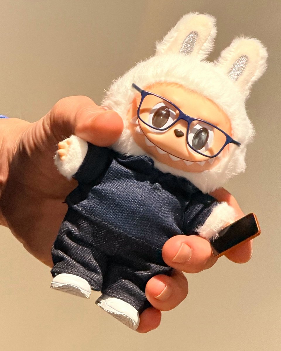 Tim Cook just got his own custom Labubu, complete with an iPhone 17 🟠