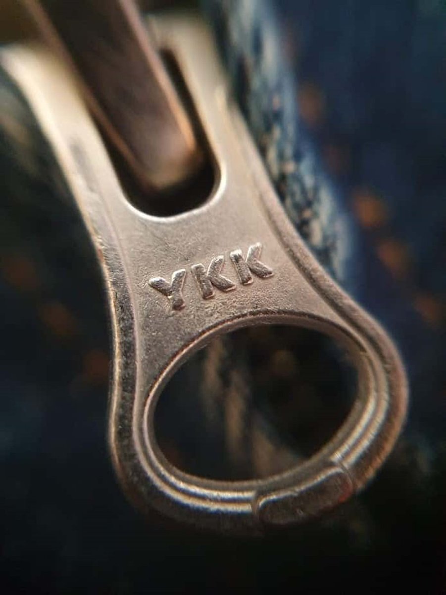 Roughly half of all zippers in the world are stamped with the letters ...