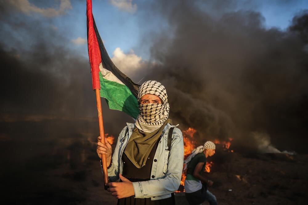 The Palestinian keffiyeh, a scarf steeped in a rich tapestry of history ...