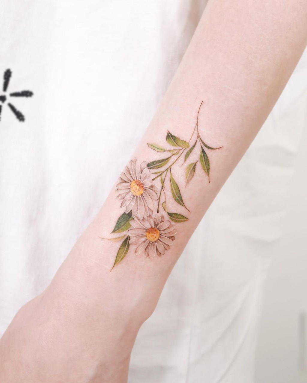 Daisy Tattoos On Wrist