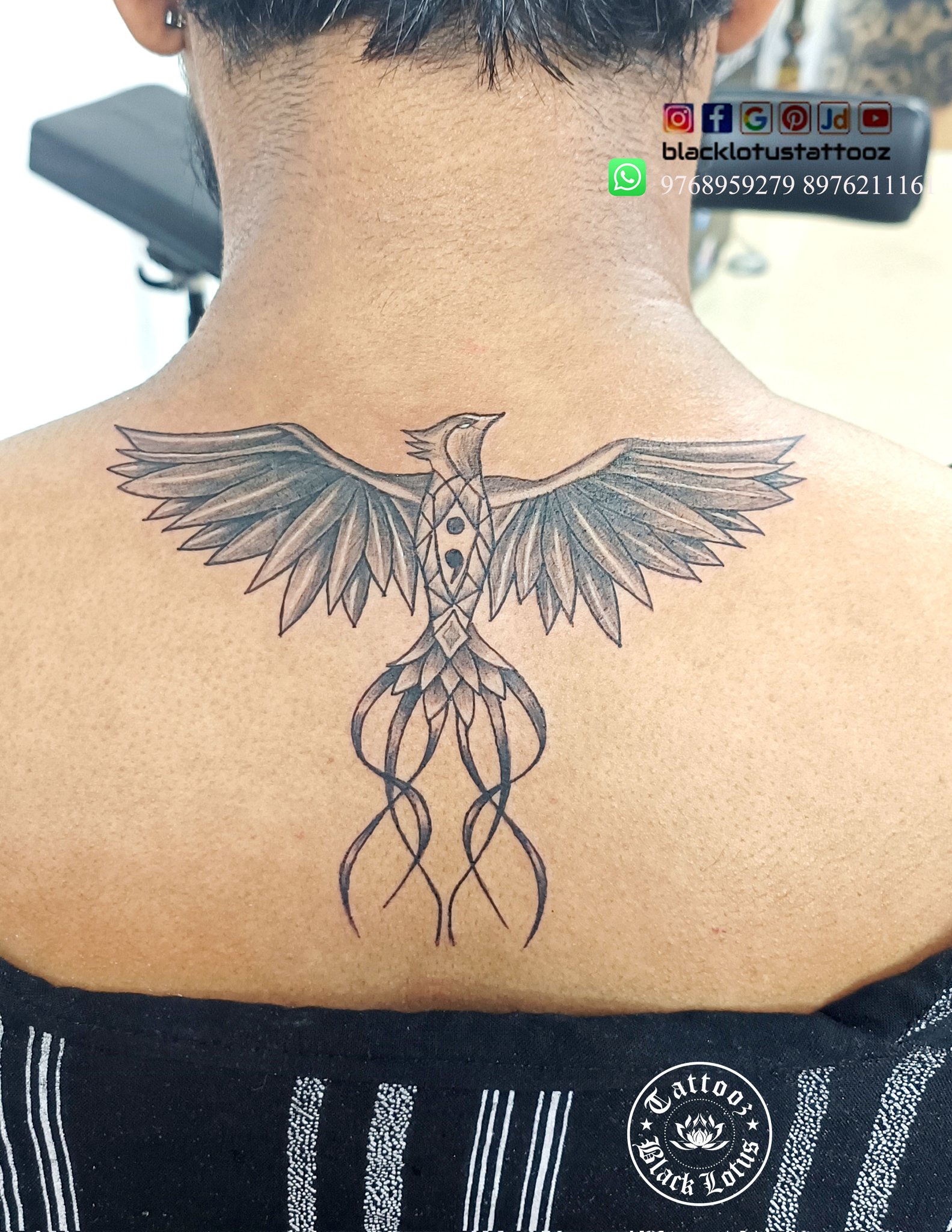Bird Tattoo Across Back